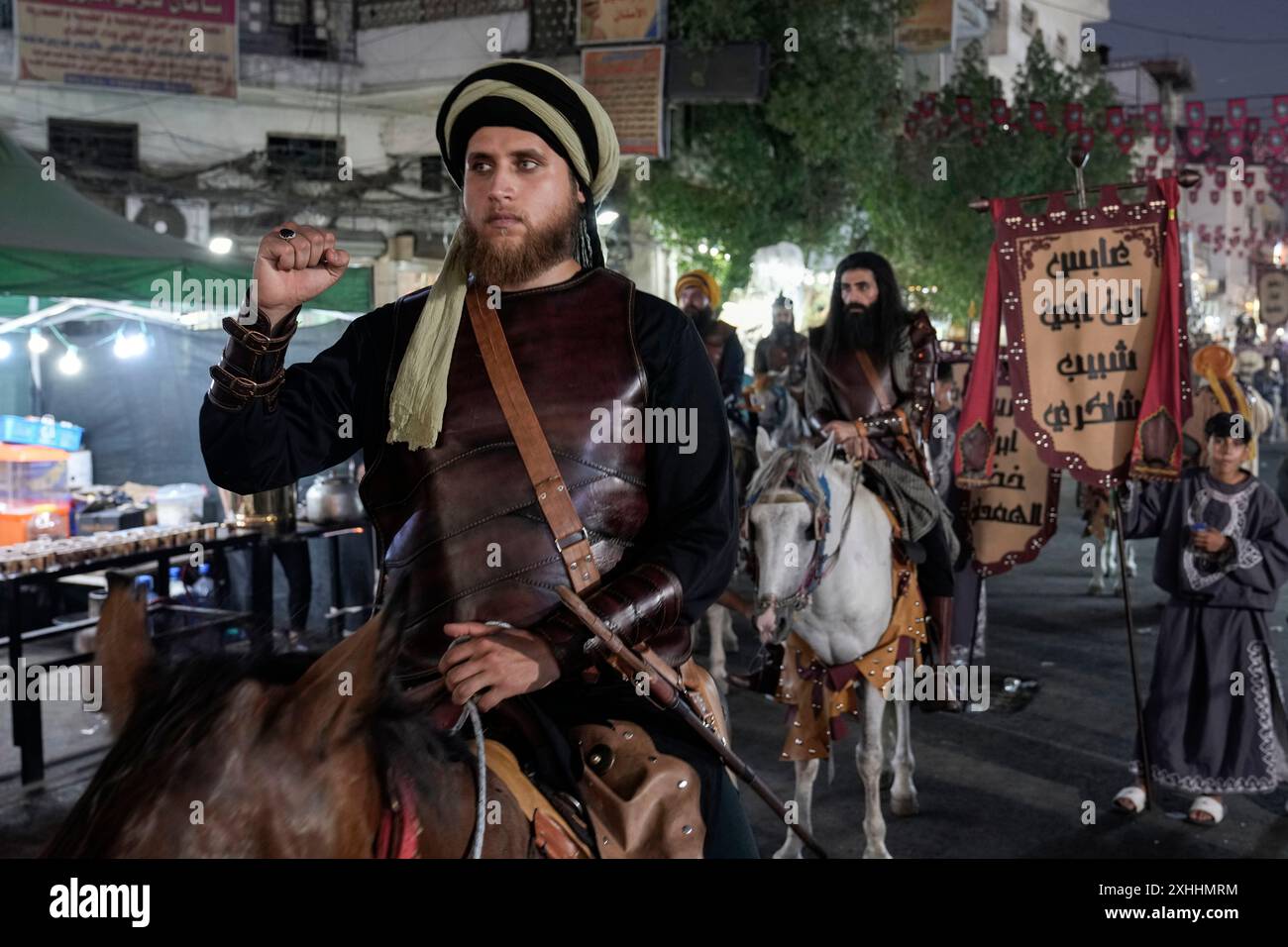 Iraqi Shiite wear traditional clothes to perform the epic of Imam ...