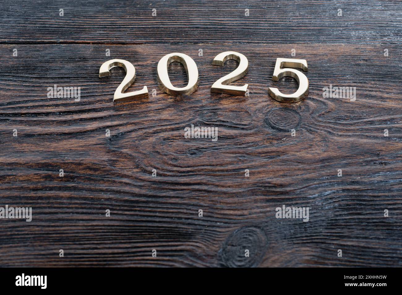 Happy New Year. Symbol from number 2025 on wooden background Stock ...