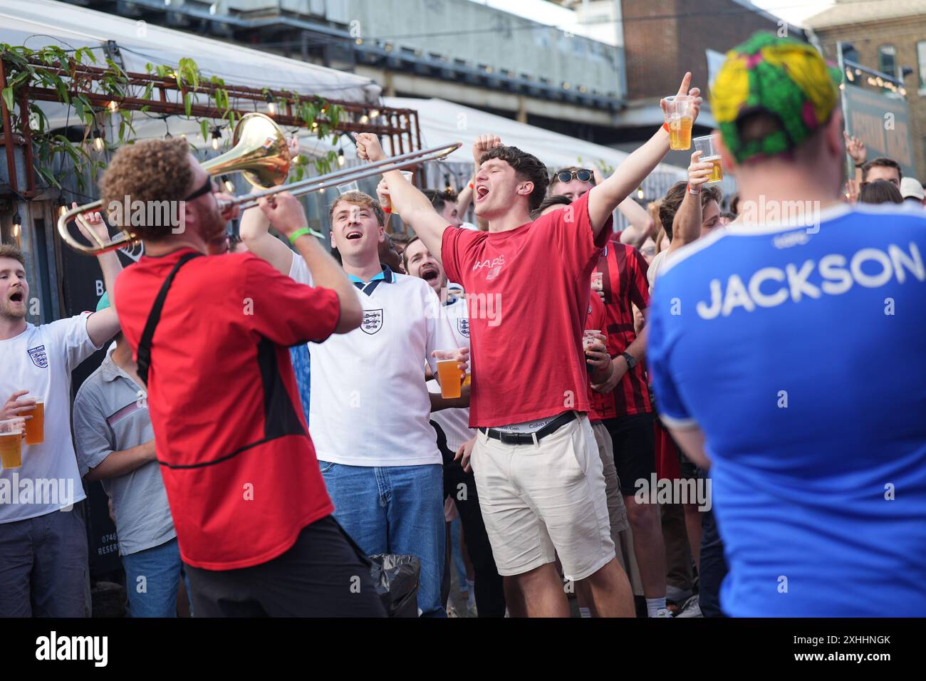 The Saka Horns performing for England fans at Peckham Arches in London ...