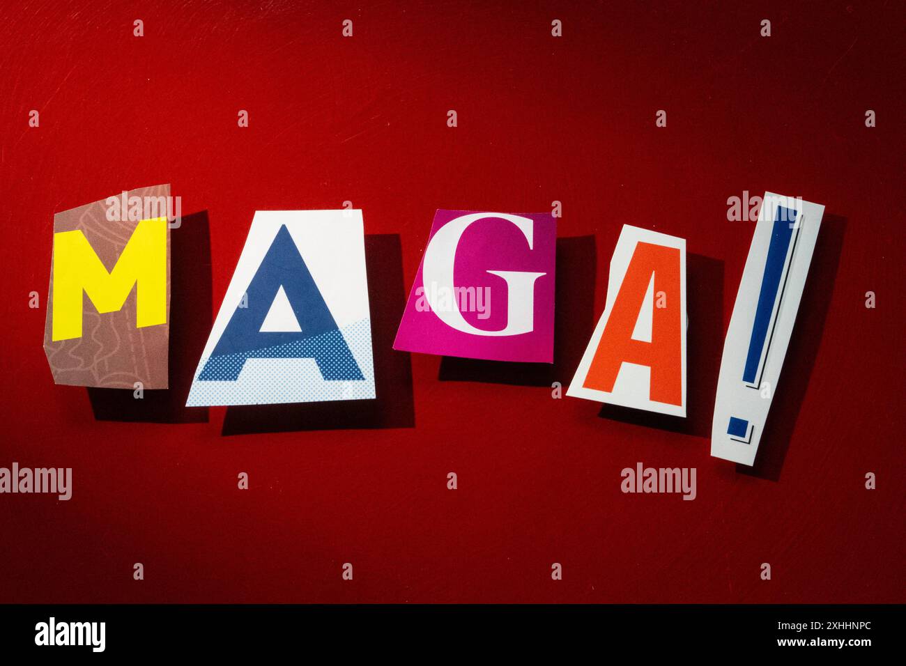 The Slogan "MAGA" using cut-out paper letters in the ransom note effect ...