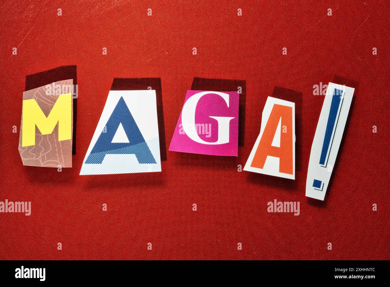 The Slogan "MAGA" using cut-out paper letters in the ransom note effect ...