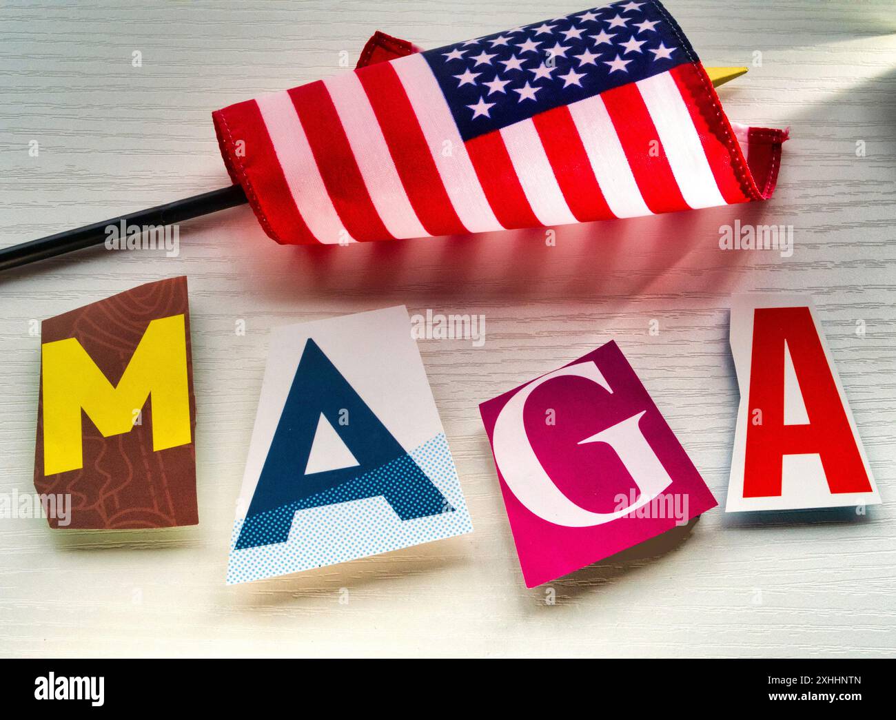 The Slogan "MAGA" using cut-out paper letters in the ransom note effect ...