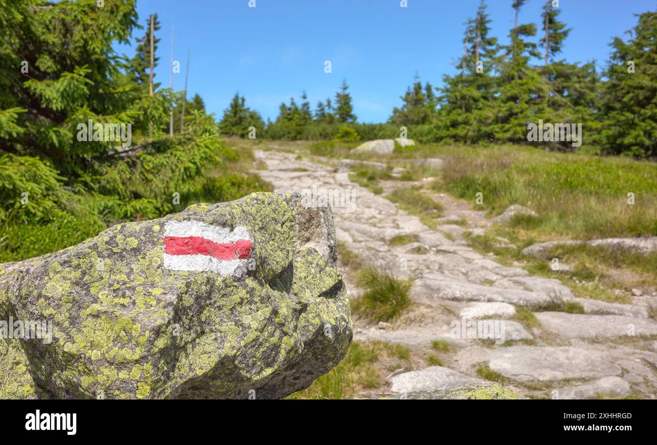 Red trail marker painted on a rock, Karkonosze (Giant Mountains ...
