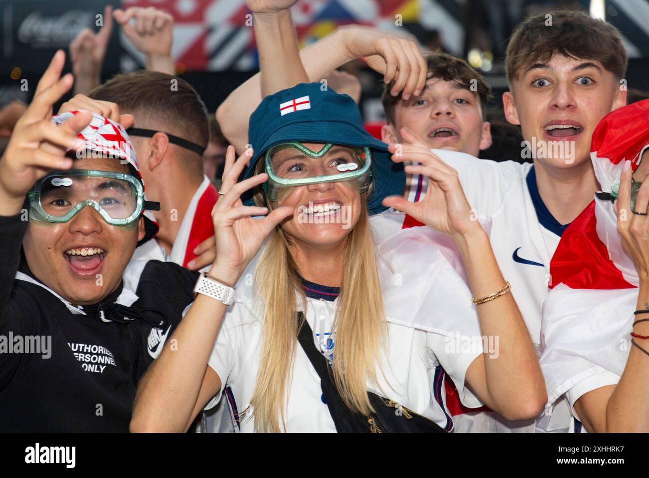EDITORIAL USE ONLY England fans wear 'Cheer Goggles' by Specsavers ...