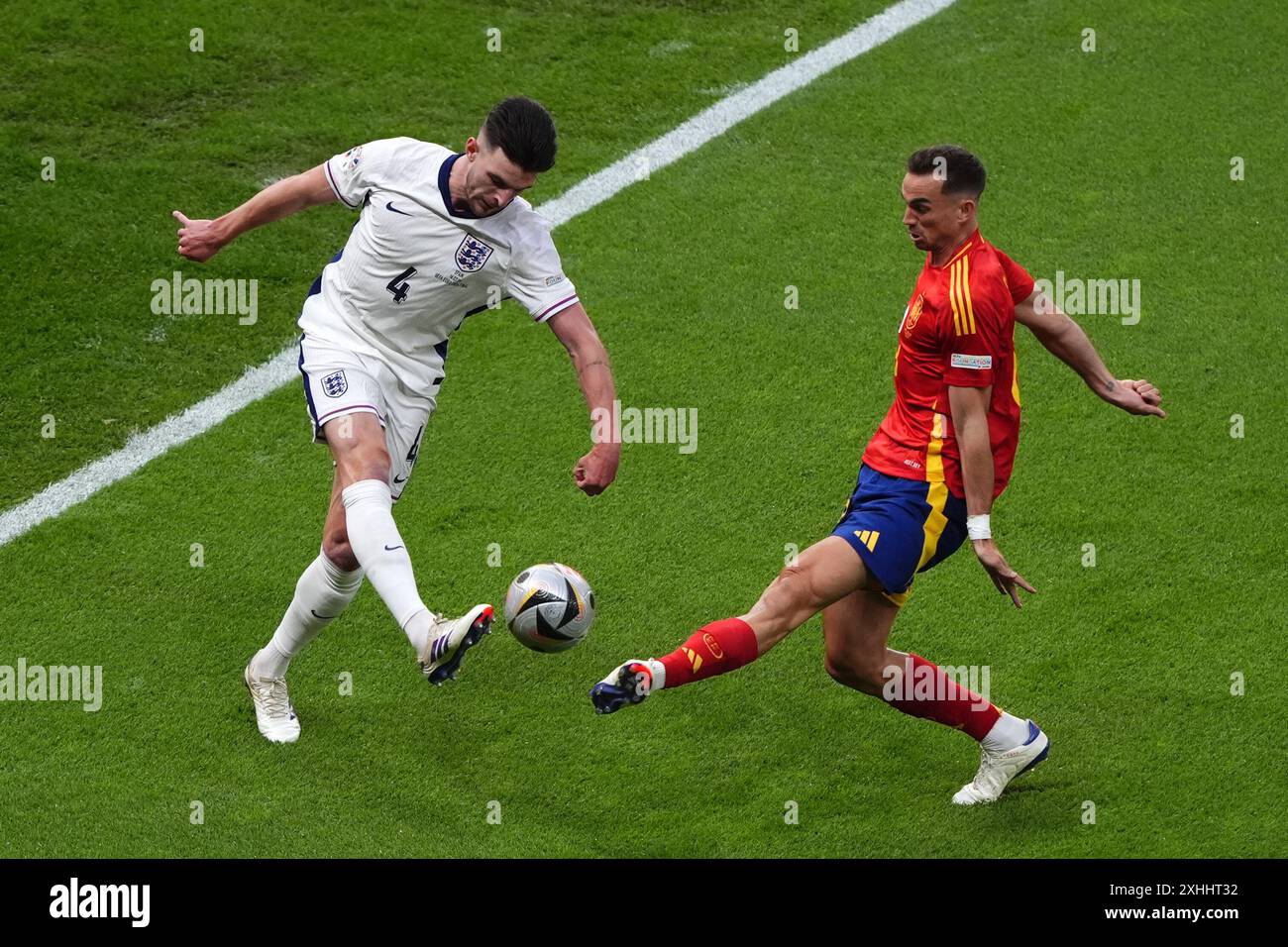England's Declan Rice and Spain's Fabian Ruiz battle for the ball ...