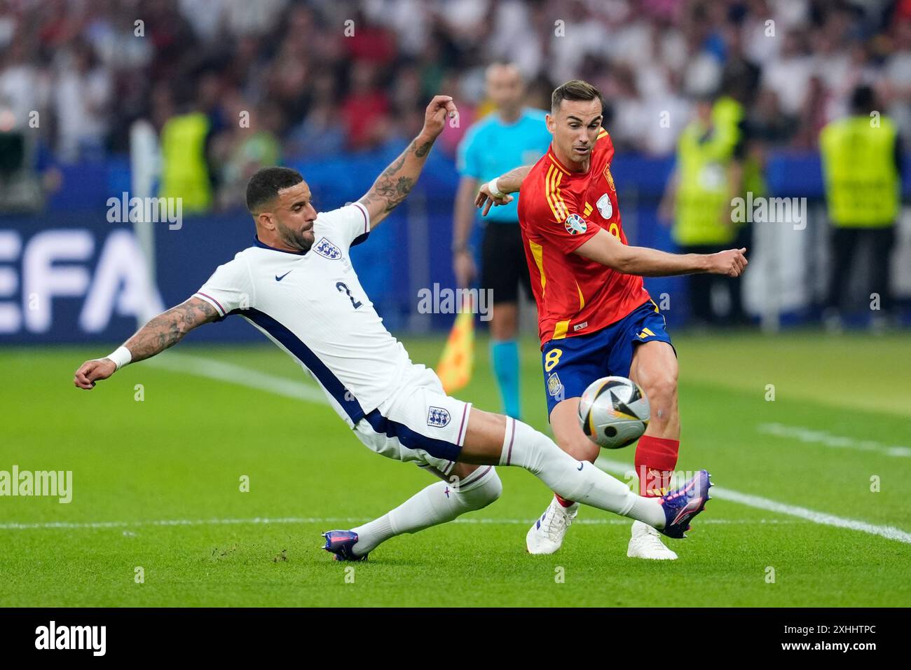 England's Kyle Walker (left) and Spain's Fabian Ruiz battle for the ...