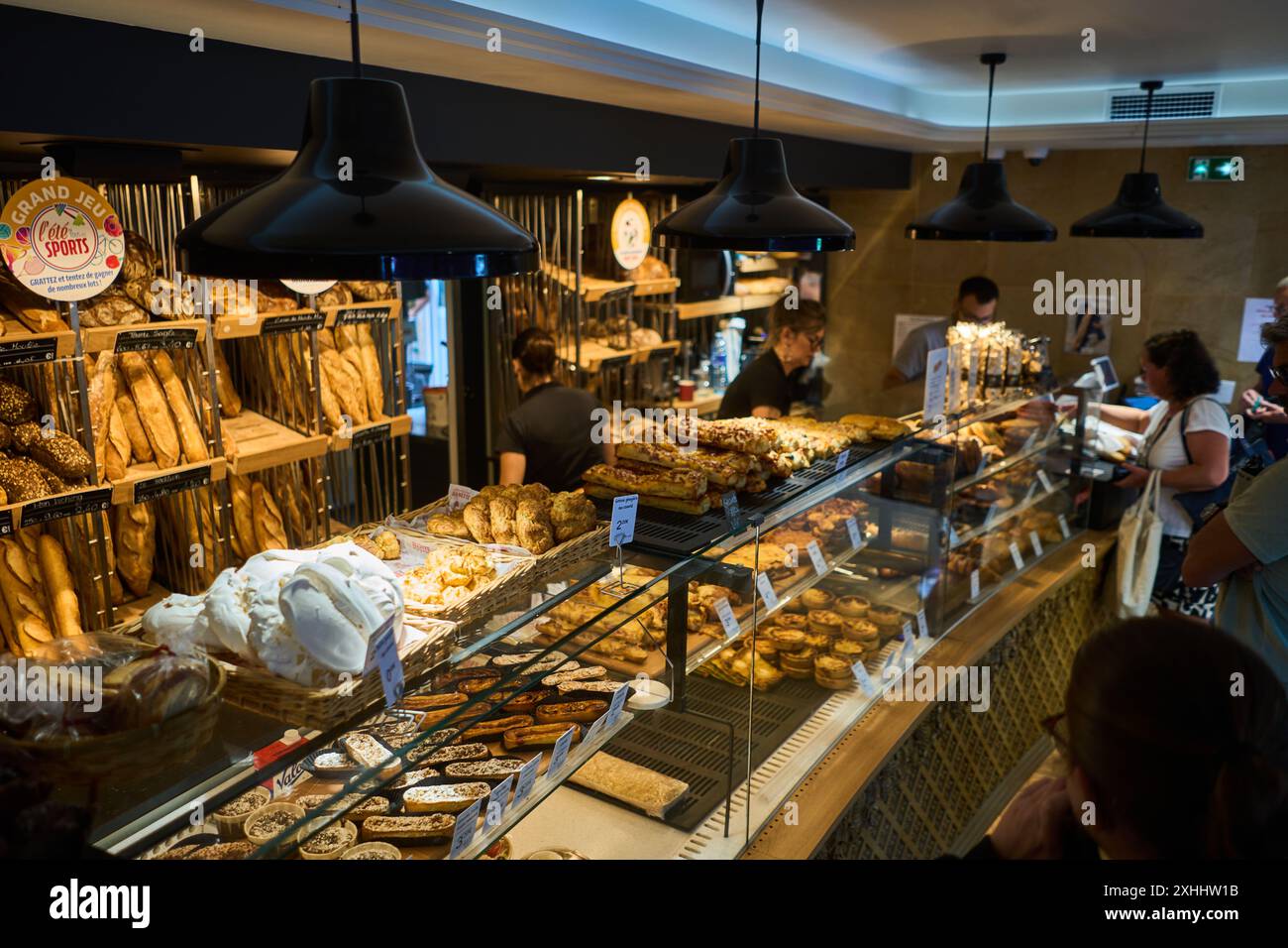 Busy Bakery Interior in Meursault with Fresh Pastries and Baguettes ...