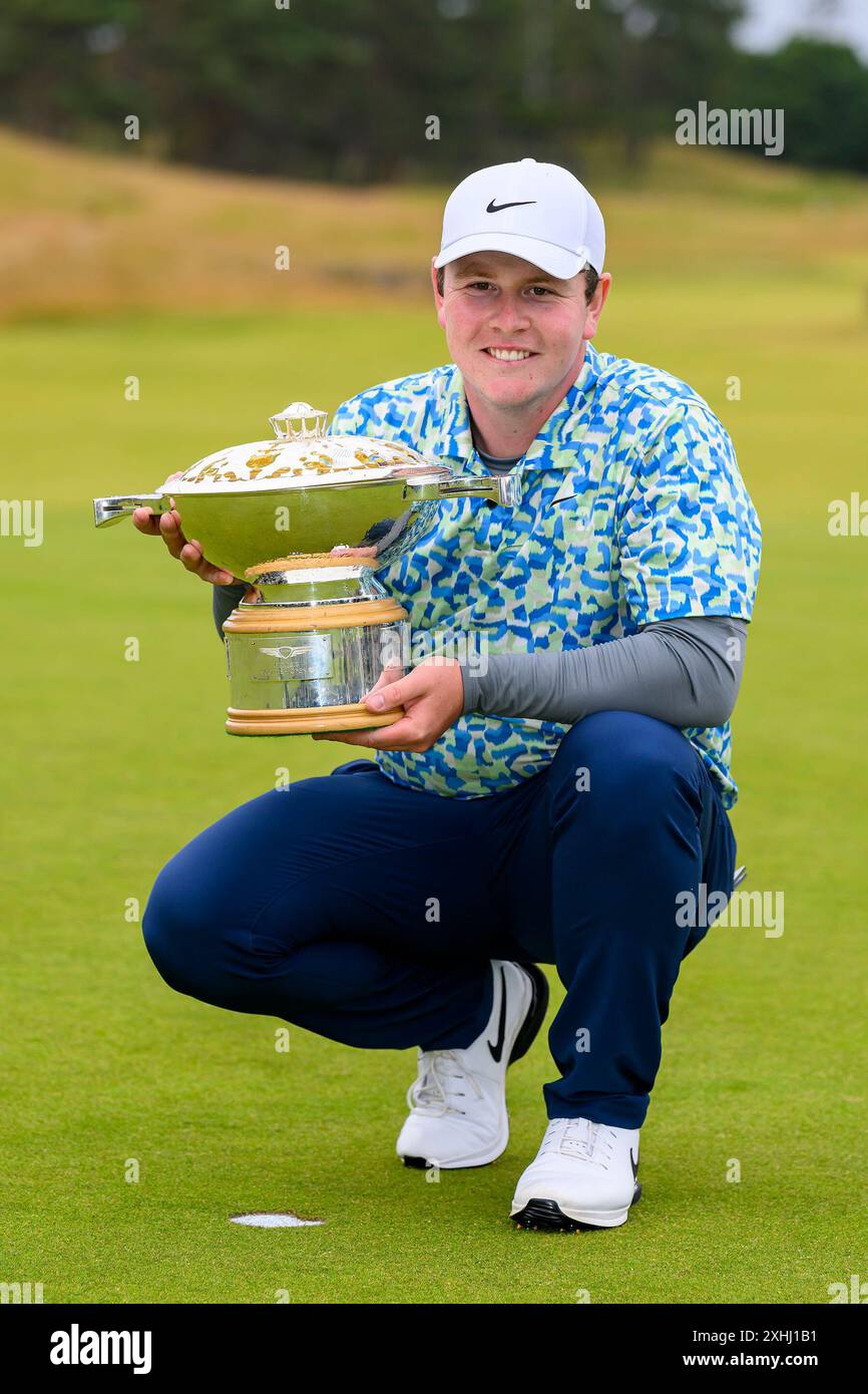 Robert MacIntyre with the Genesis Scottish Open trophy after he wins ...