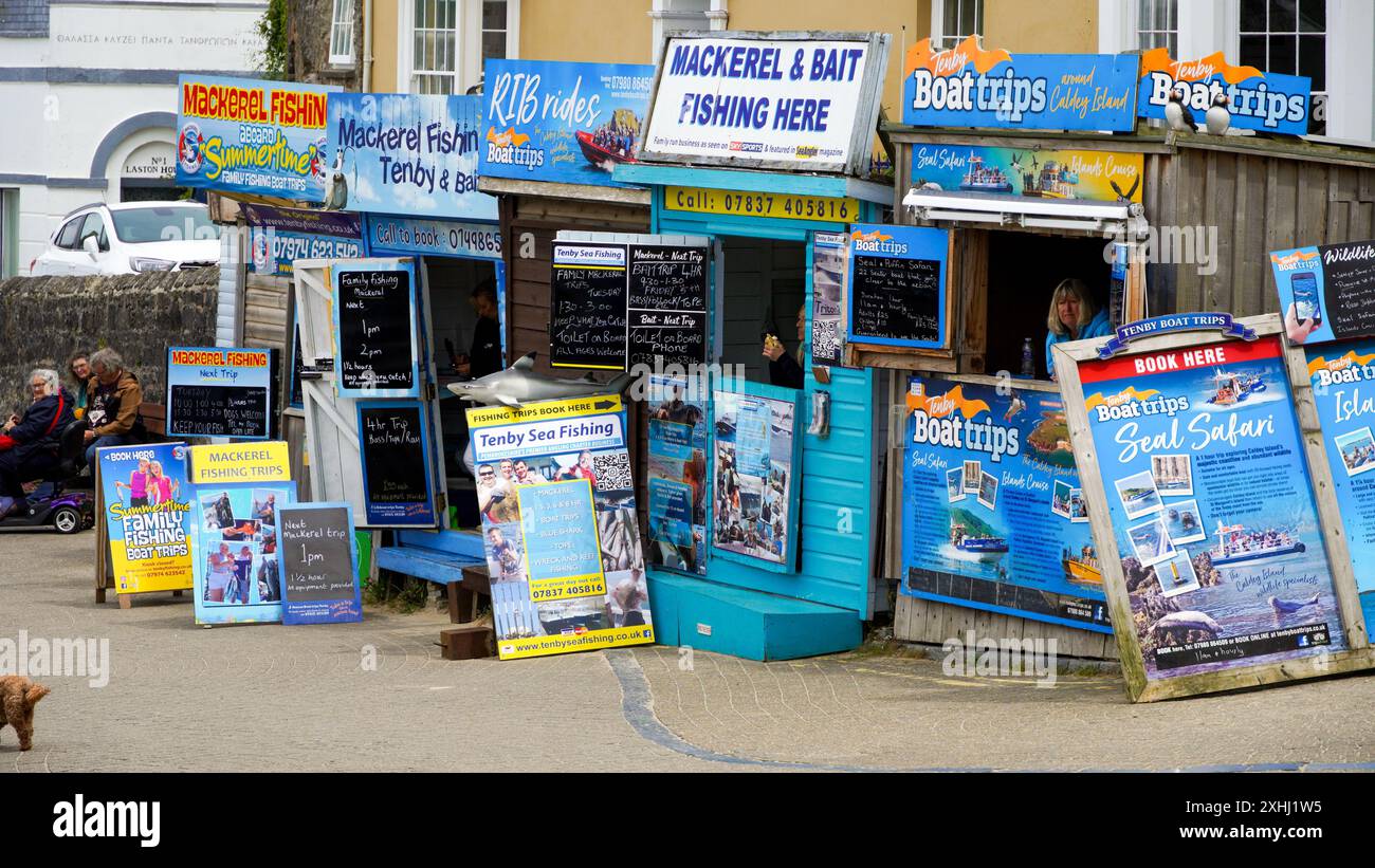 Tenby, Pembrokeshire, Wales - July 02 2024: Small huts selling fishing ...
