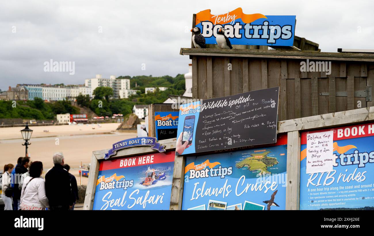 Tenby, Pembrokeshire, Wales - July 02 2024: Small huts selling fishing ...