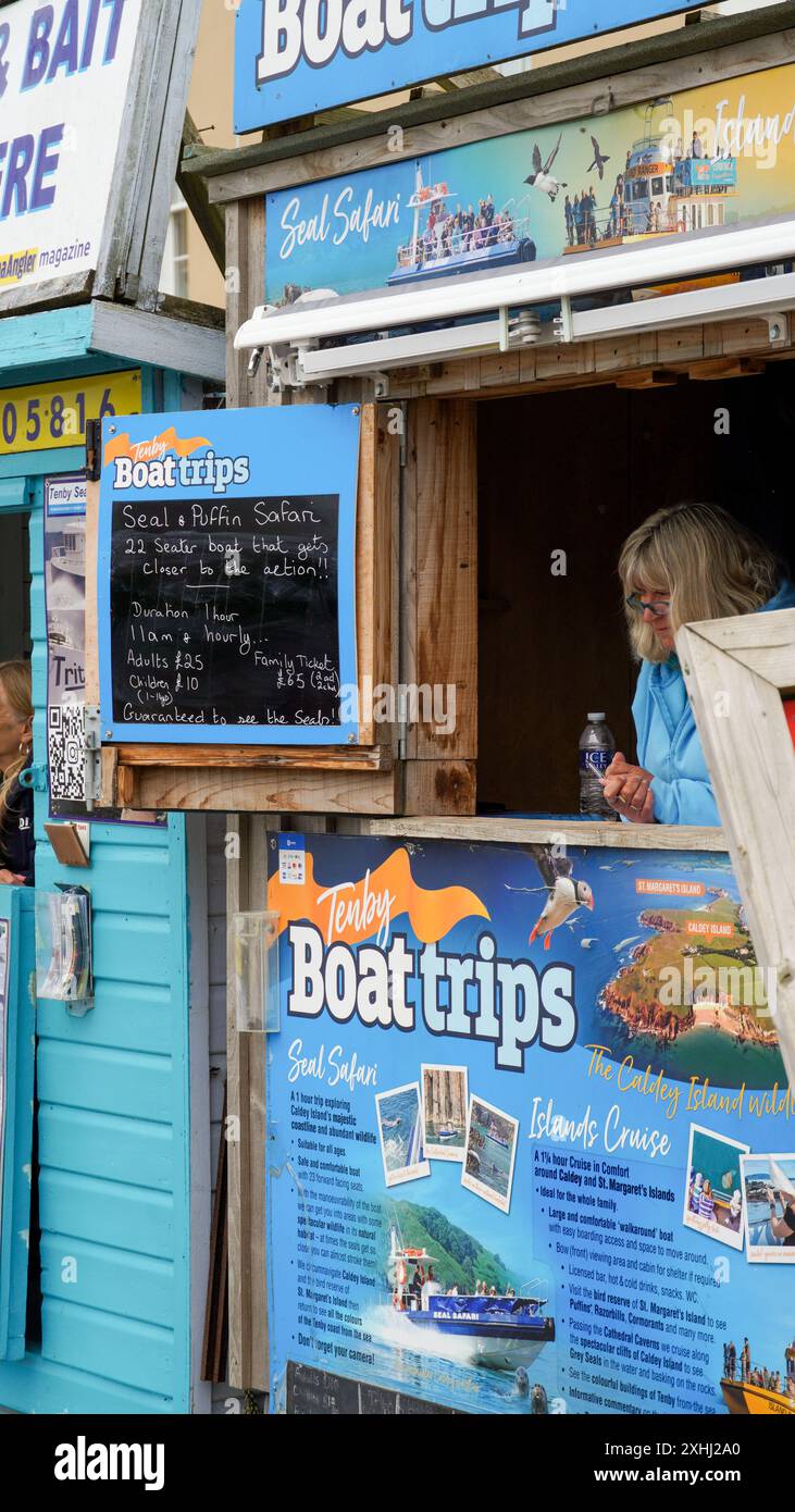 Tenby, Pembrokeshire, Wales - July 02 2024: Small huts selling fishing ...