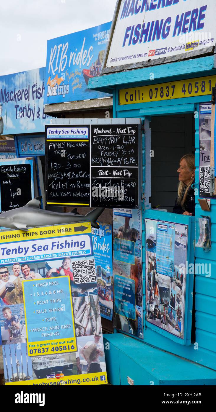 Tenby, Pembrokeshire, Wales - July 02 2024: Small huts selling fishing ...