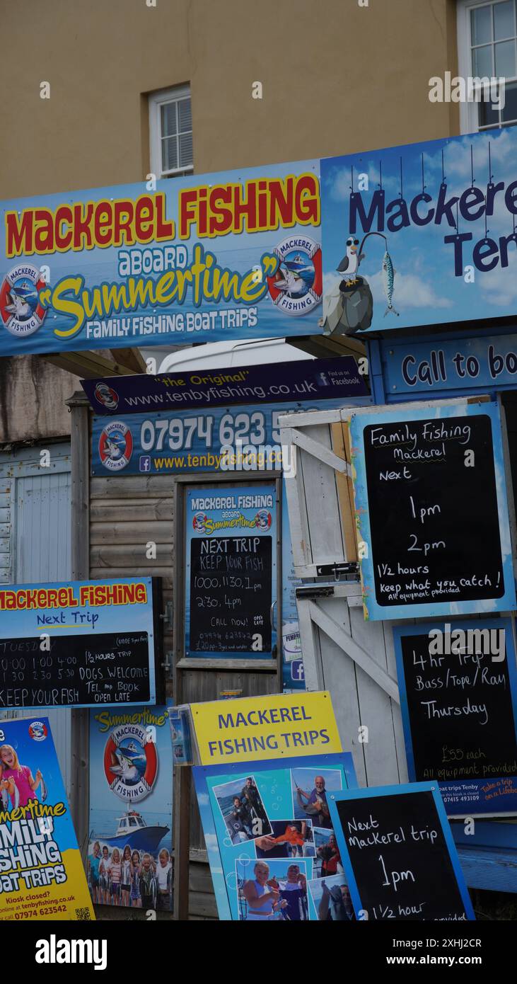 Tenby, Pembrokeshire, Wales - July 02 2024: Small huts selling fishing ...