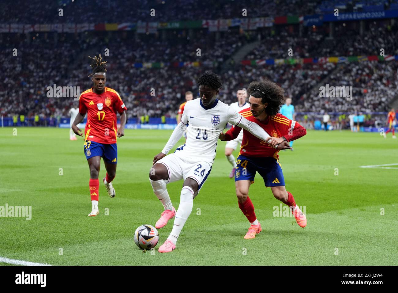 England's Kobbie Mainoo (left) and Spain's Marc Cucurella battle for ...