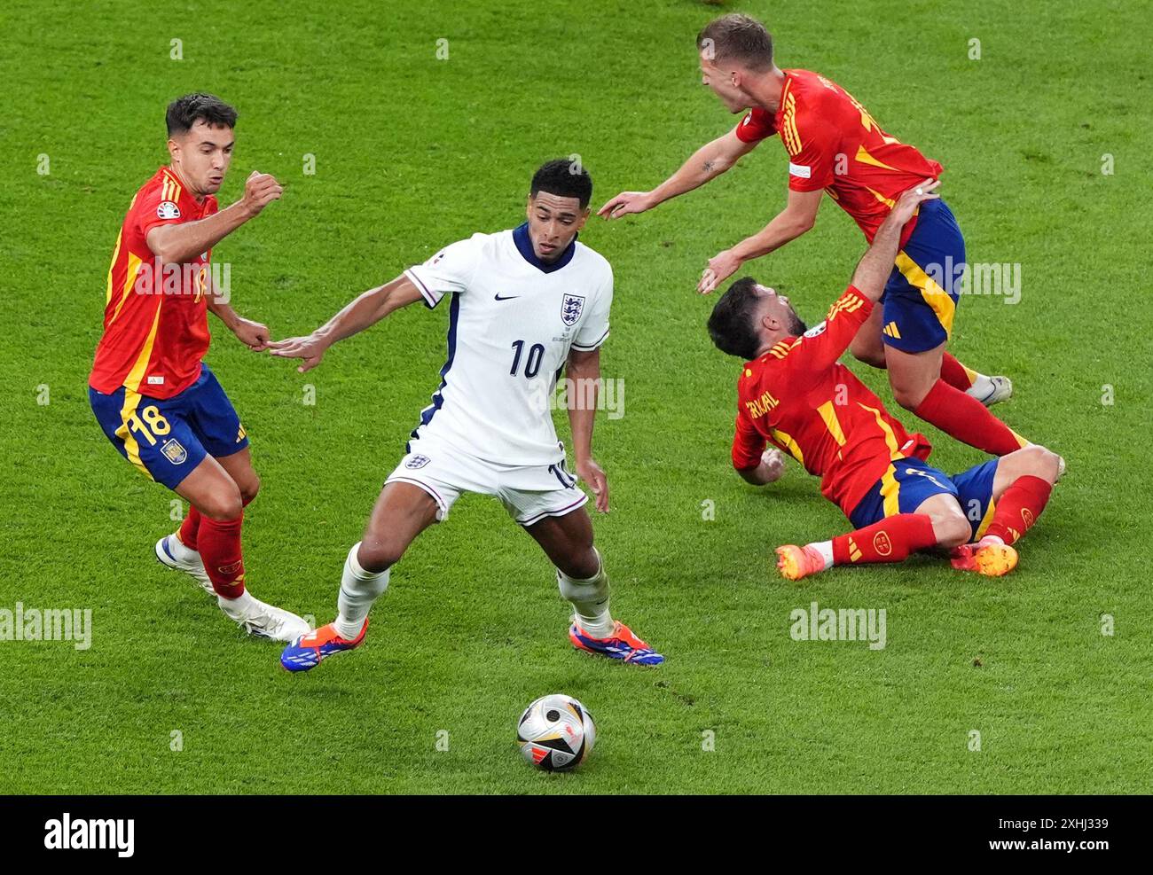 England's Jude Bellingham holds off Spain's Martin Zubimendi during the ...