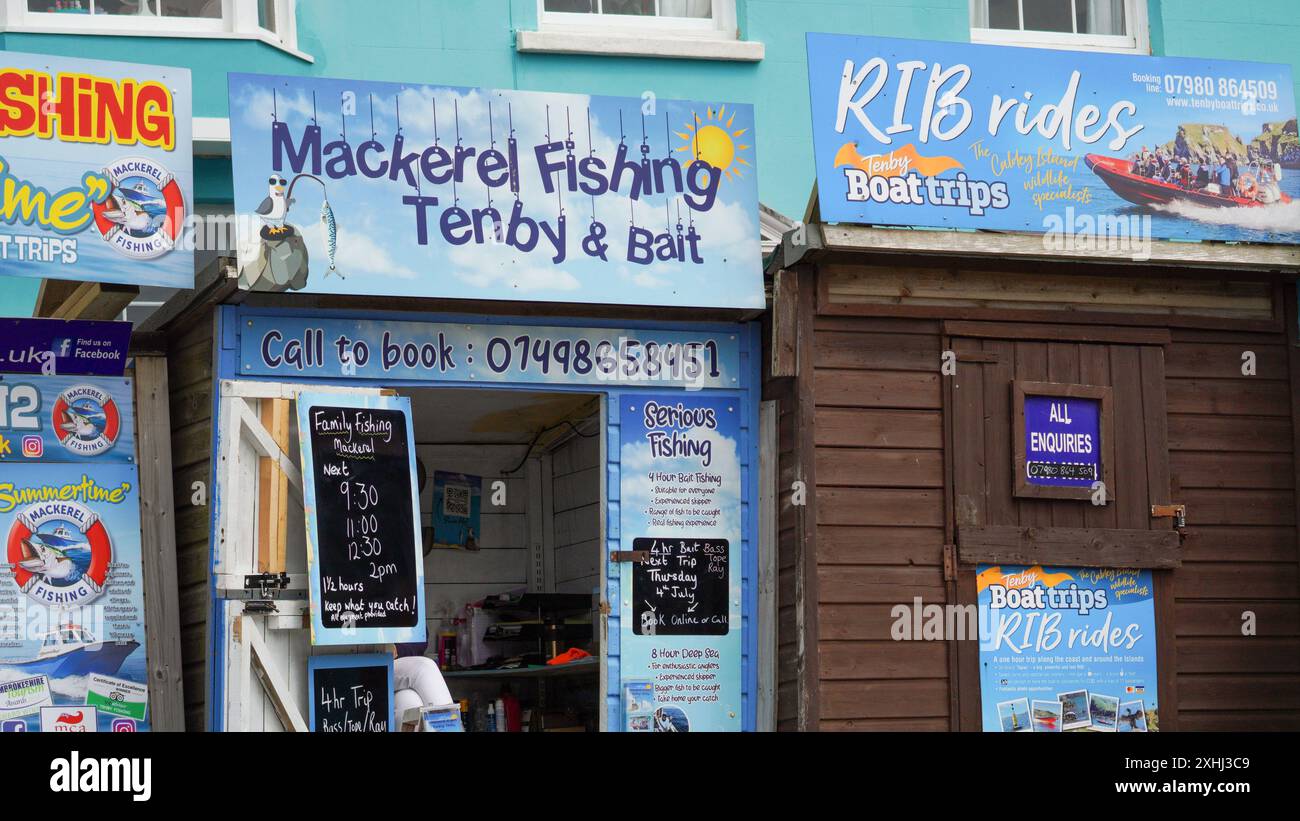 Tenby, Pembrokeshire, Wales - July 02 2024: Small huts selling fishing ...