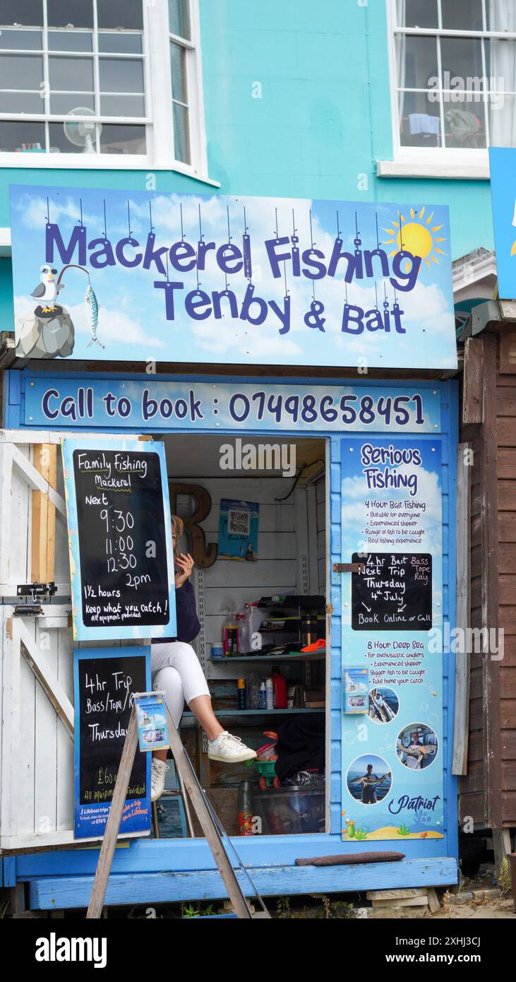 Tenby, Pembrokeshire, Wales - July 02 2024: Small huts selling fishing ...