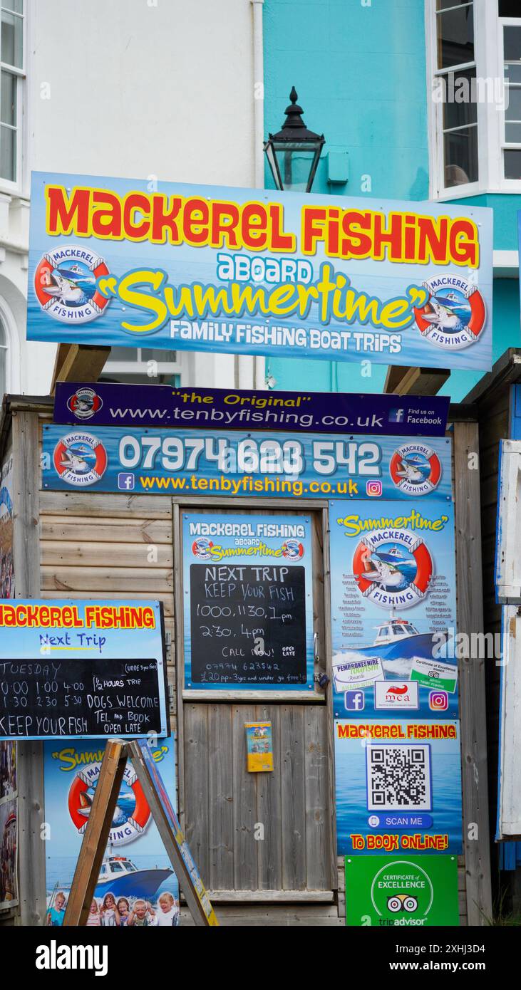 Tenby, Pembrokeshire, Wales - July 02 2024: Small huts selling fishing ...