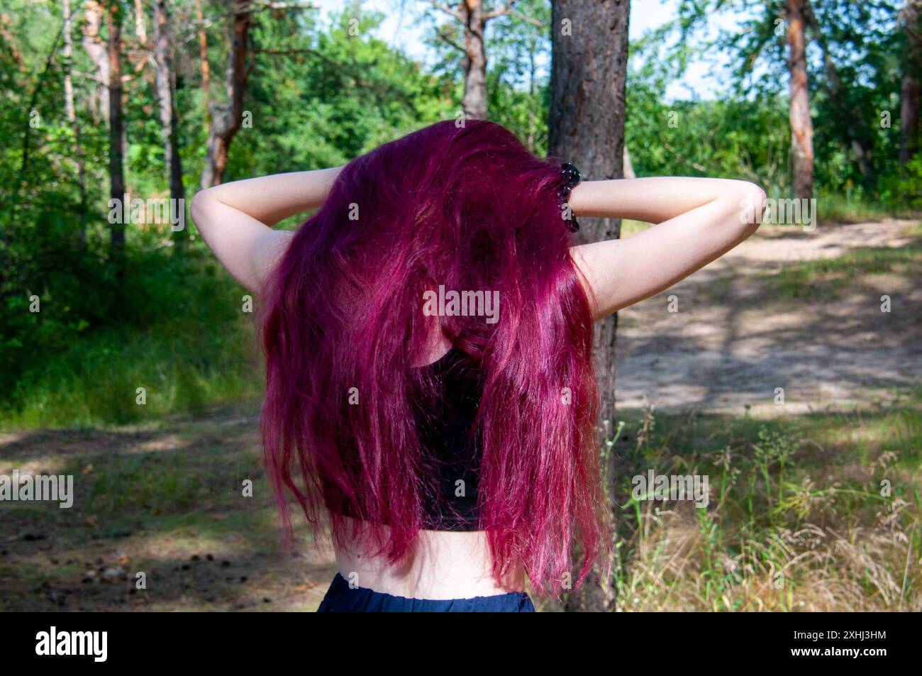 The girl with the red hair A girl with red hair drinks water Samara ...