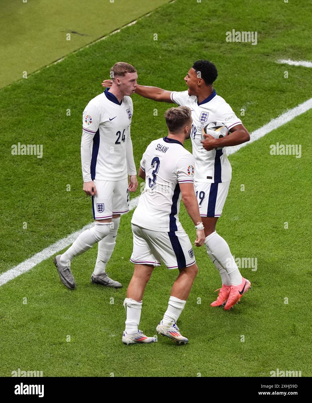 England's Cole Palmer (left) celebrates scoring their side's first goal ...