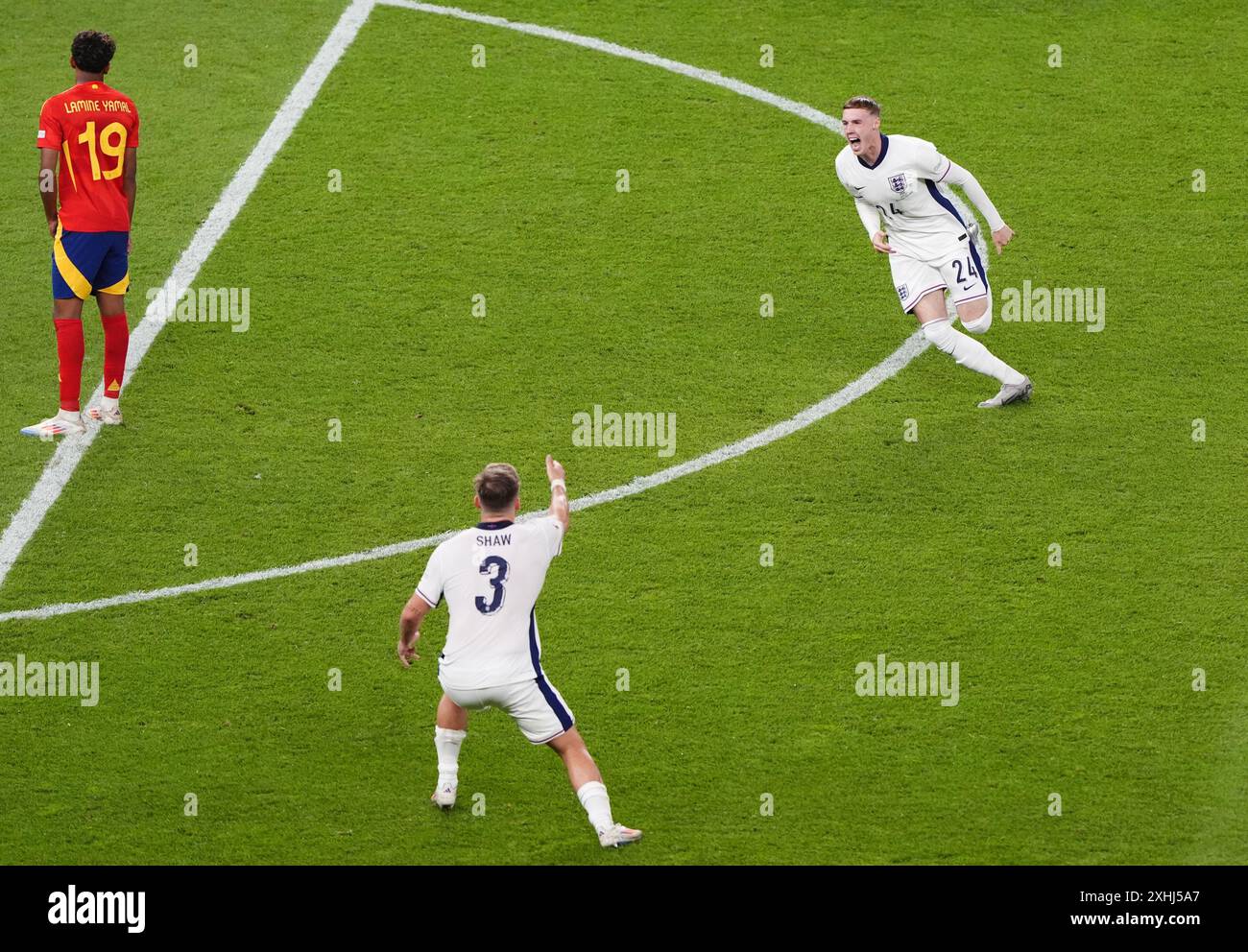 England's Cole Palmer (right) celebrates scoring their side's first ...