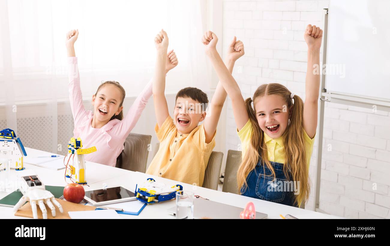 Excited Children Celebrate Successful STEM Project Completion Stock ...