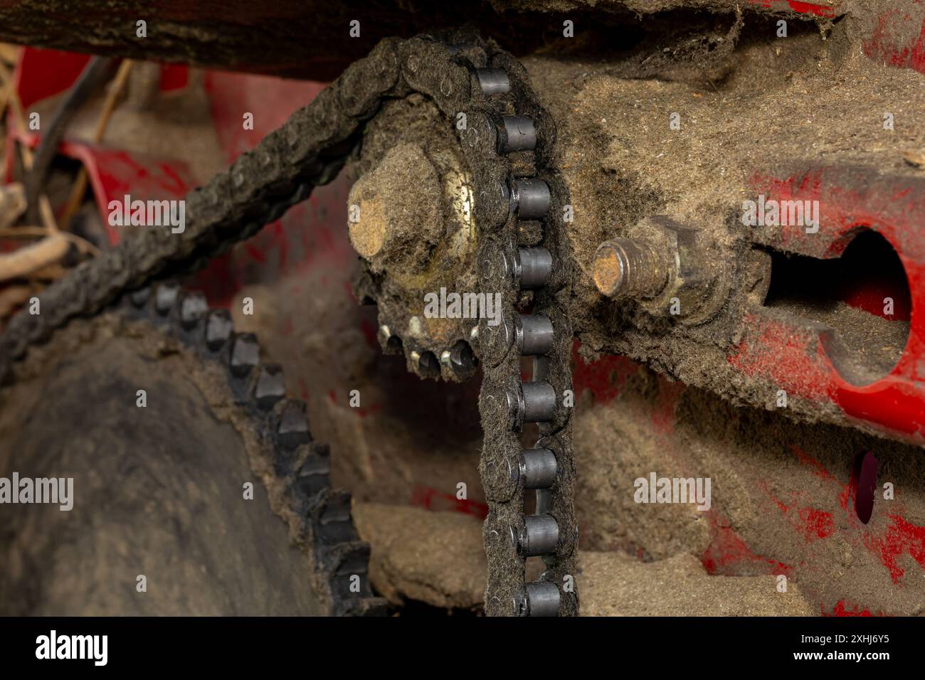 Closeup of combine harvester chain and gear sprocket. Farming equipment ...