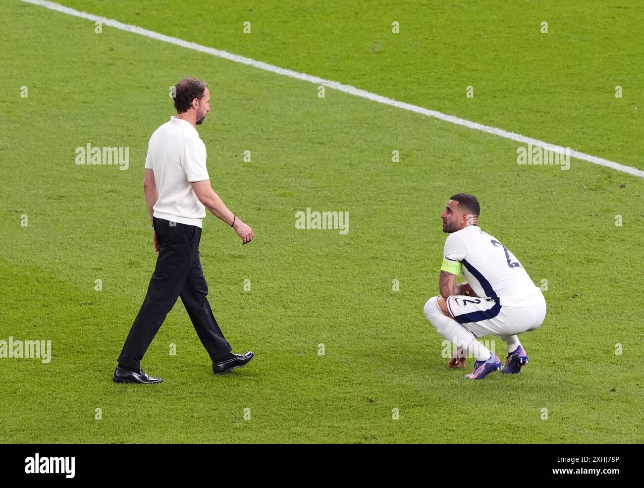 England manager Gareth Southgate greets Kyle Walker following defeat in ...