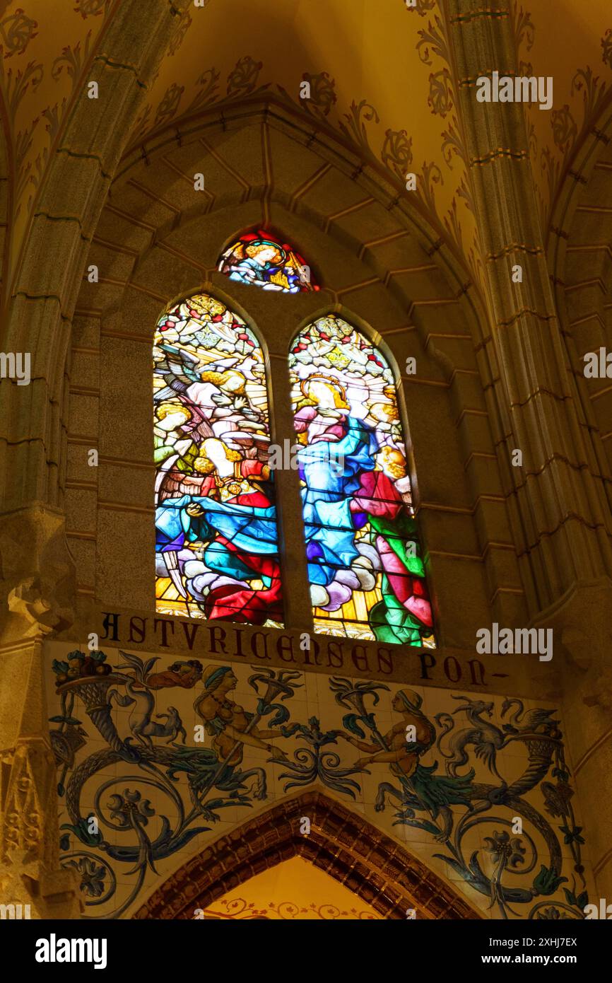 Astorga, Spain - June 4, 2023: A vibrant stained glass window depicting biblical figures ...