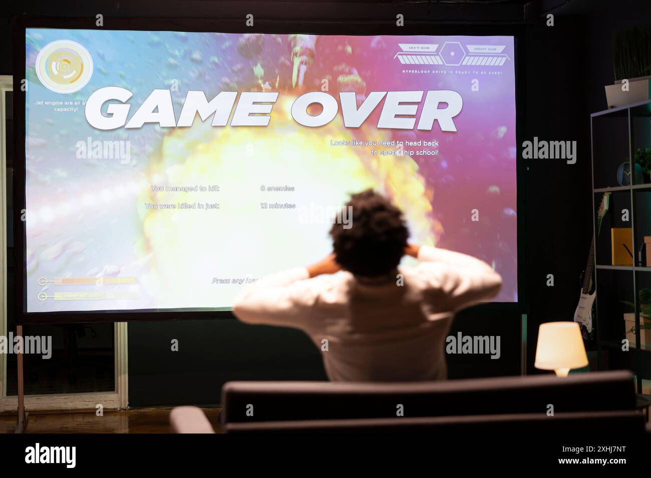 Gamer upset at seeing game over message on ultrawide TV screen playing ...