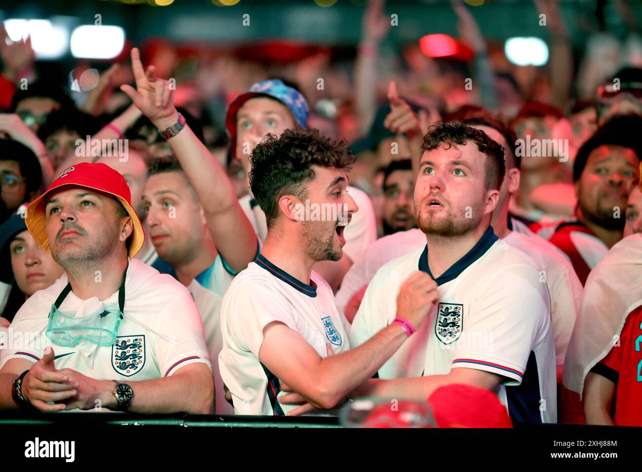 England fans react at BOXPark Wembley in London during a screening of ...