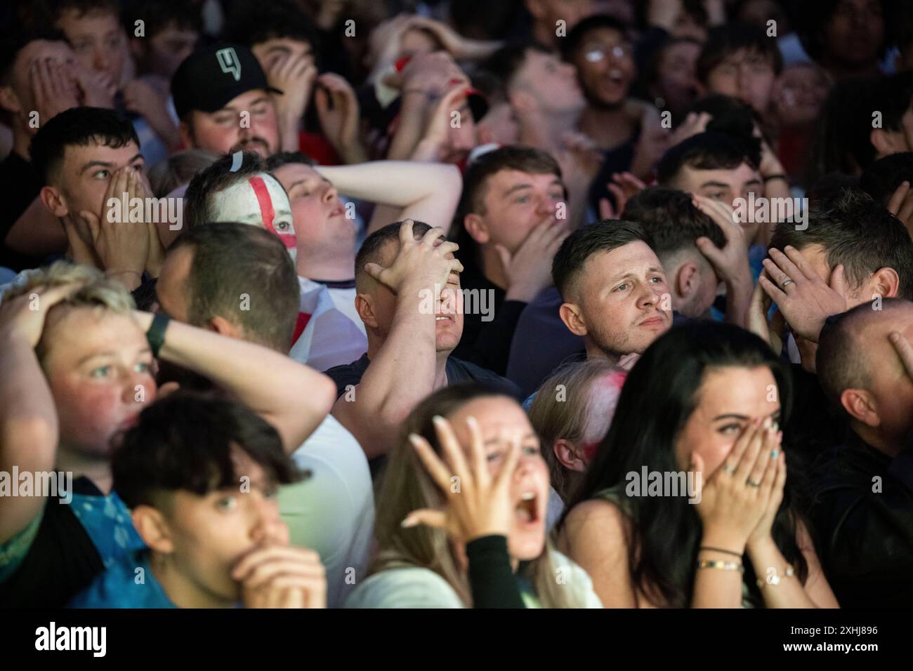 Manchester, UK. 14 July 2024. England fans react to defeat at the UEFA ...