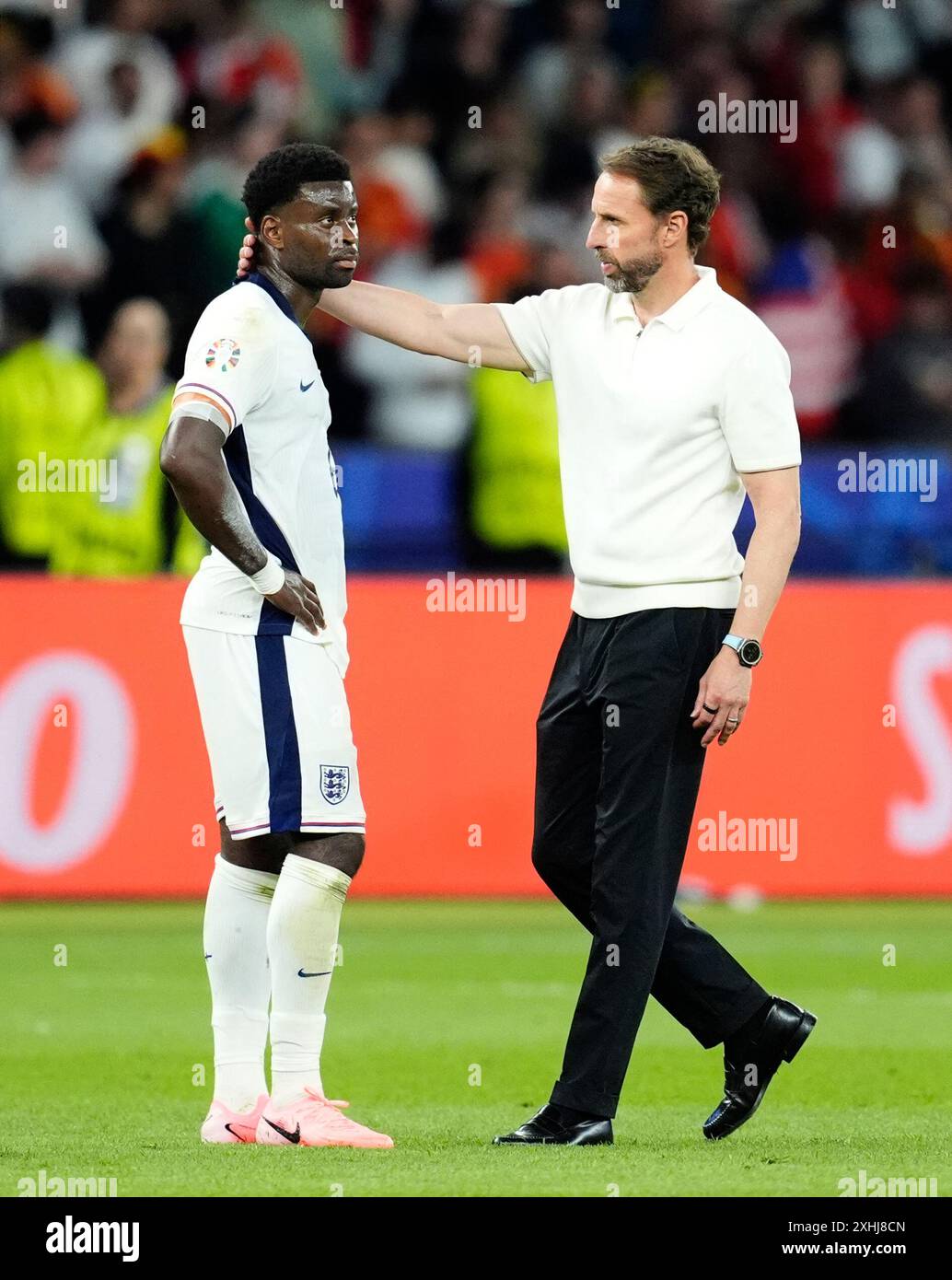 England manager Gareth Southgate consoles Marc Guehi after the final ... England manager Gareth Southgate consoles Marc Guehi after the final ...