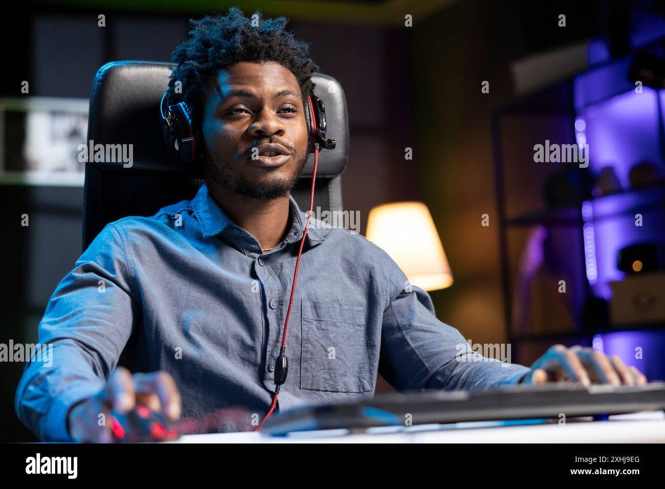 Player using headphones mic hi-res stock photography and images - Alamy