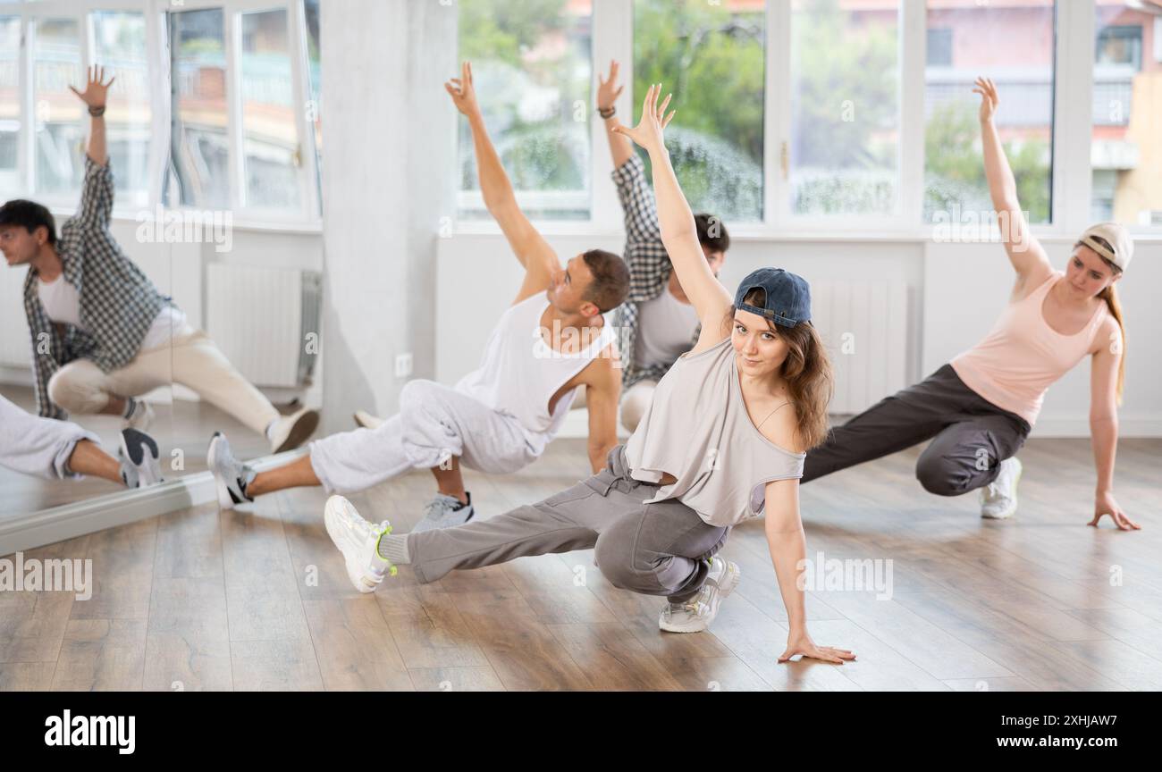 Young girl practicing breakdance floor-works in training hall Stock ...