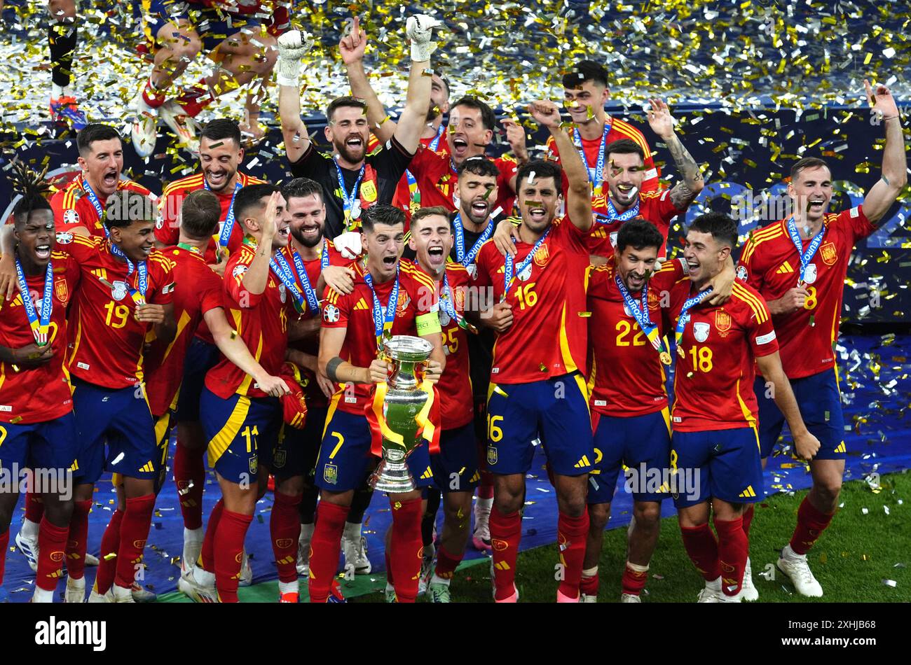 Spain captain Alvaro Morata lifts the trophy with team mates following ...
