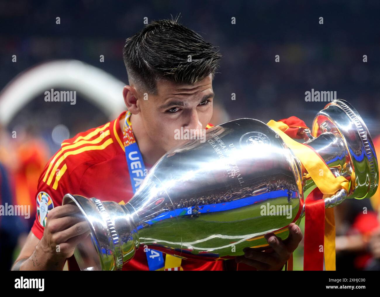 Spain's Alvaro Morata celebrates with the trophy after winning the UEFA ...