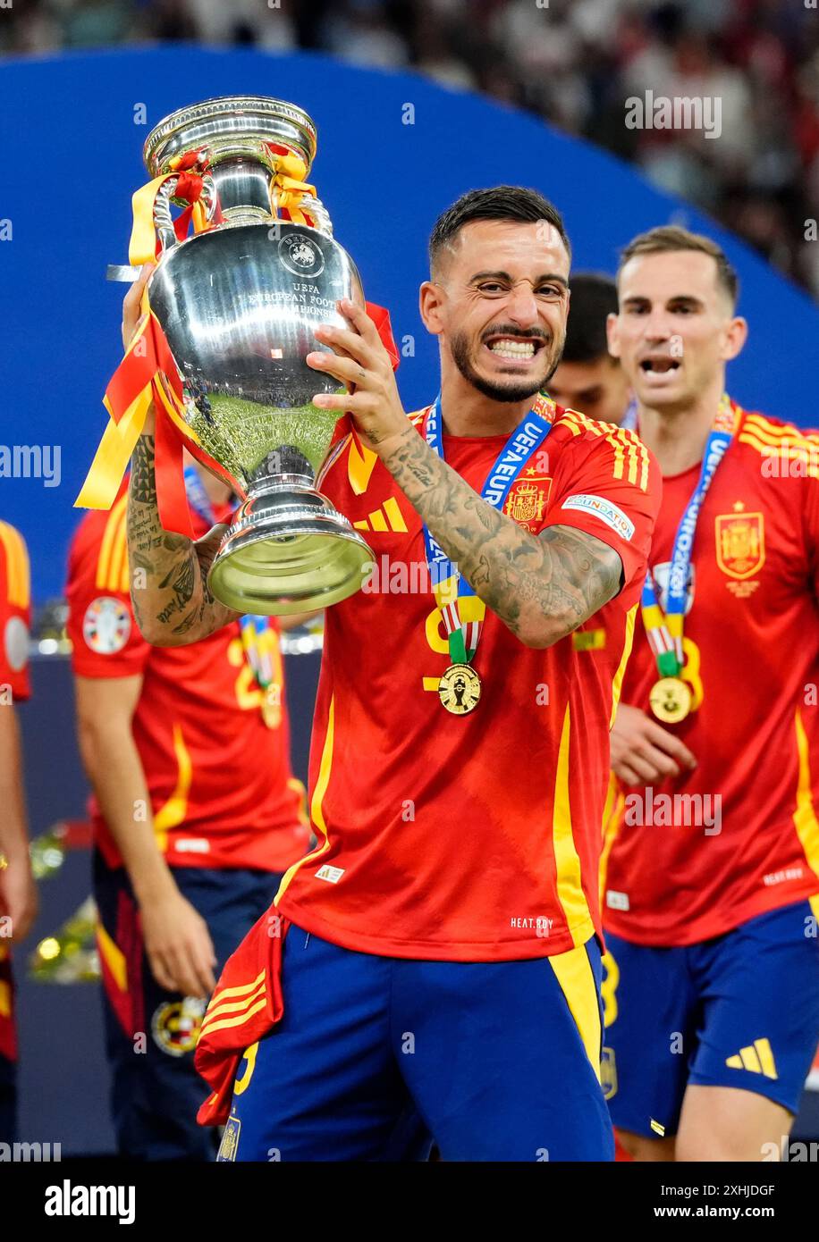 Spain's Joselu celebrates with the Henri Delaunay Cup following vicotry ...