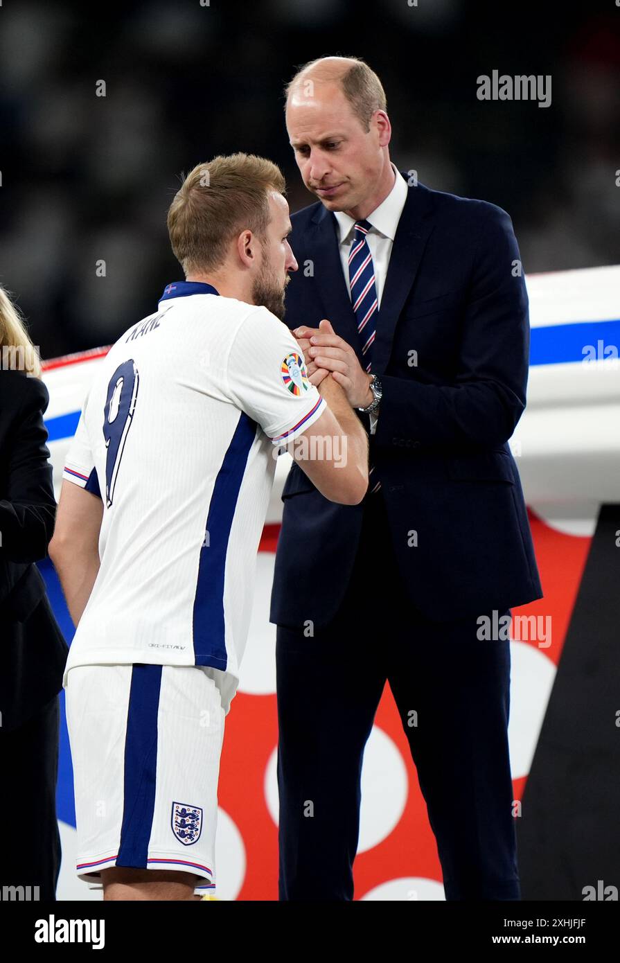 England's Harry Kane shakes hands with the Prince of Wales on the medal ...