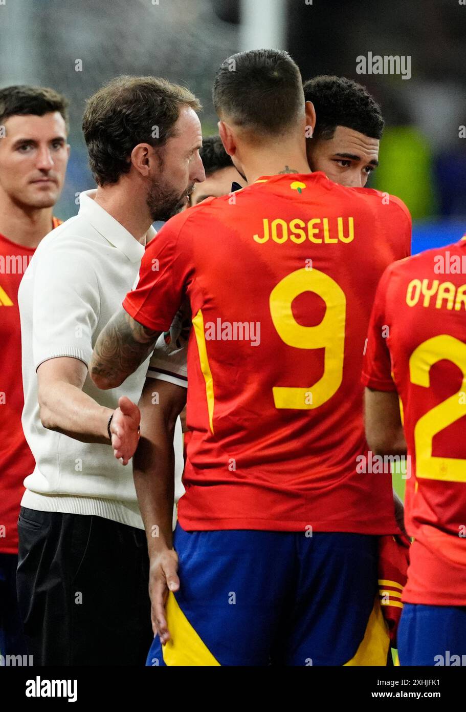England's Jude Bellingham is consoled by club mate, Spain's Joselu ...
