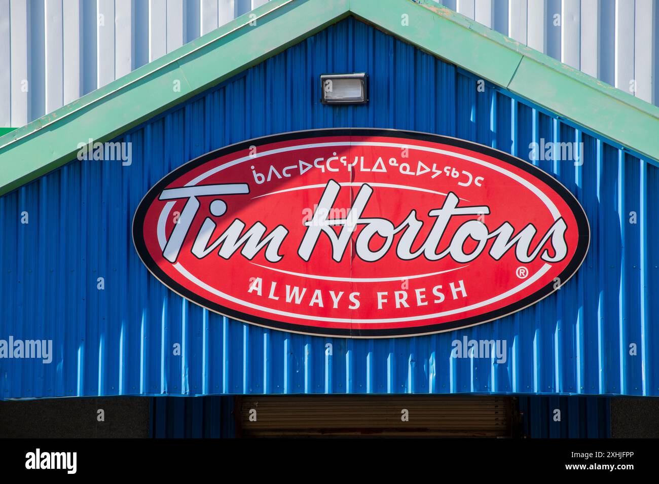 Bilingual Tim Hortons sign in English and Inuktitut at North Mart on ...