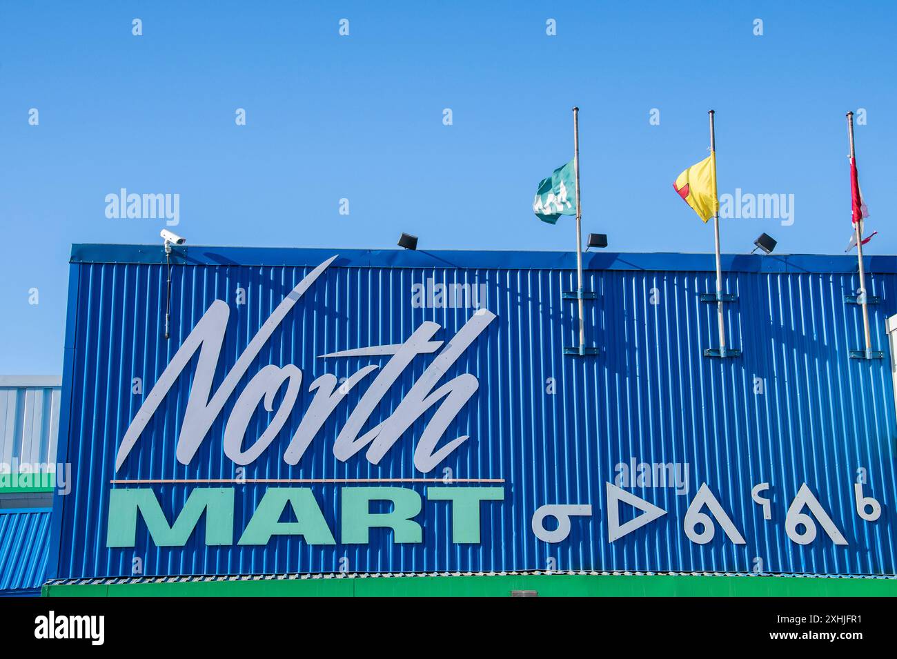 Bilingual North Mart department grocery store sign in English and ...