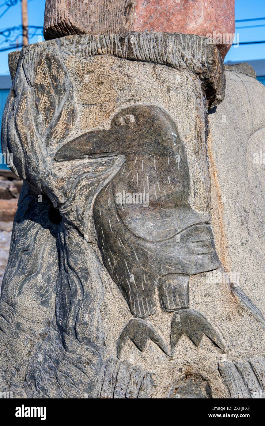Stone carving of a raven perched at Inuit sculpture park by the Four ...