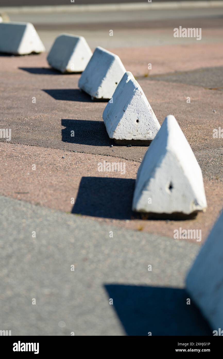 Row of concrete bollards hi-res stock photography and images - Alamy