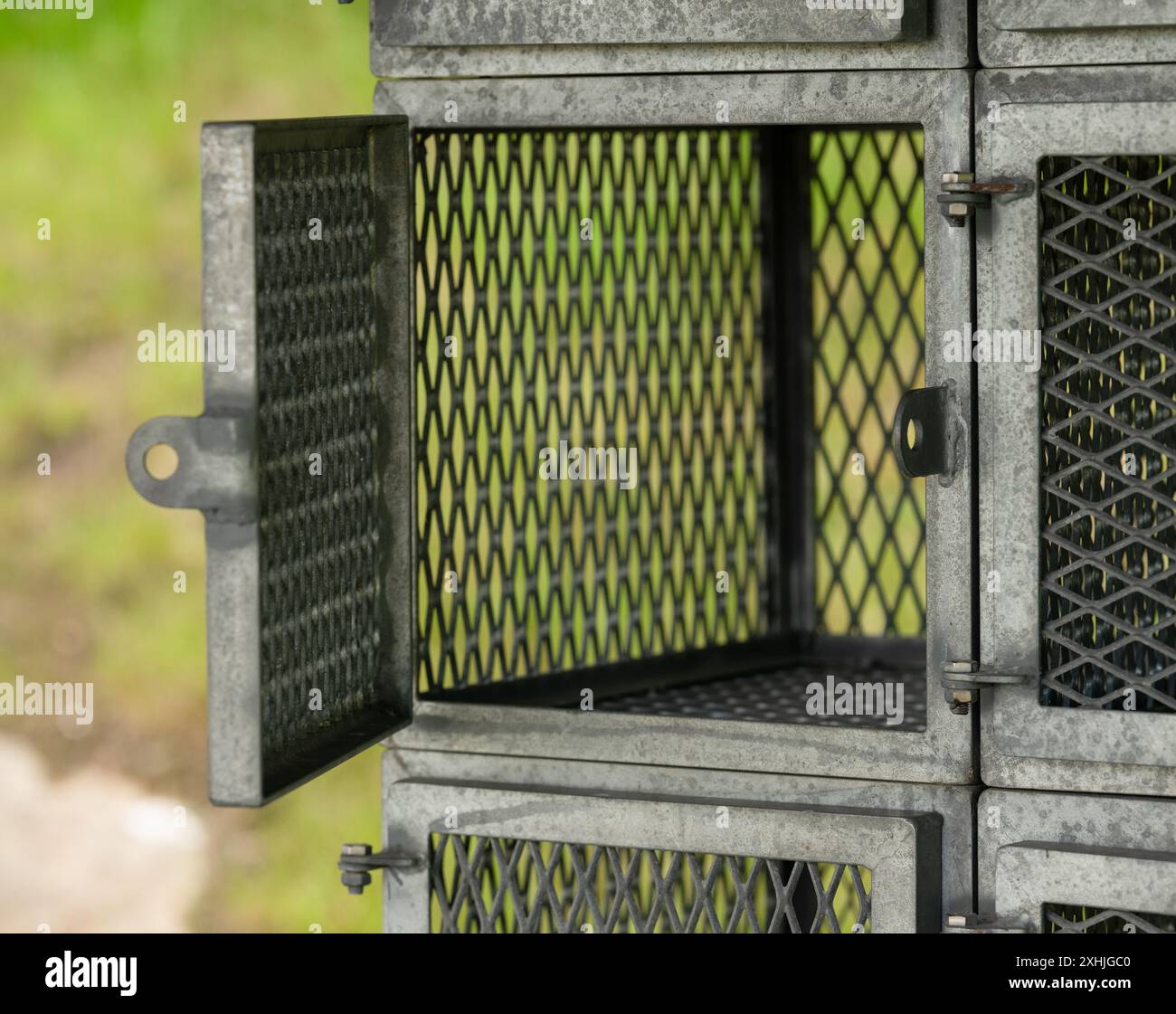 Open wire lockable metal box Stock Photo - Alamy