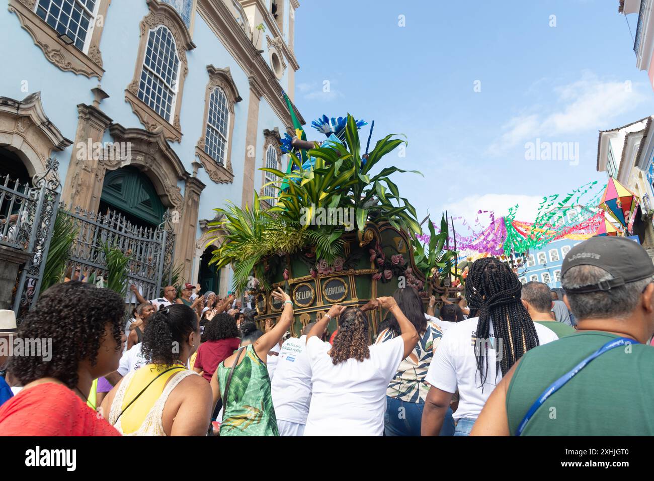 Salvador, Bahia, Brazil - June 02, 2024: People push a cart with ...