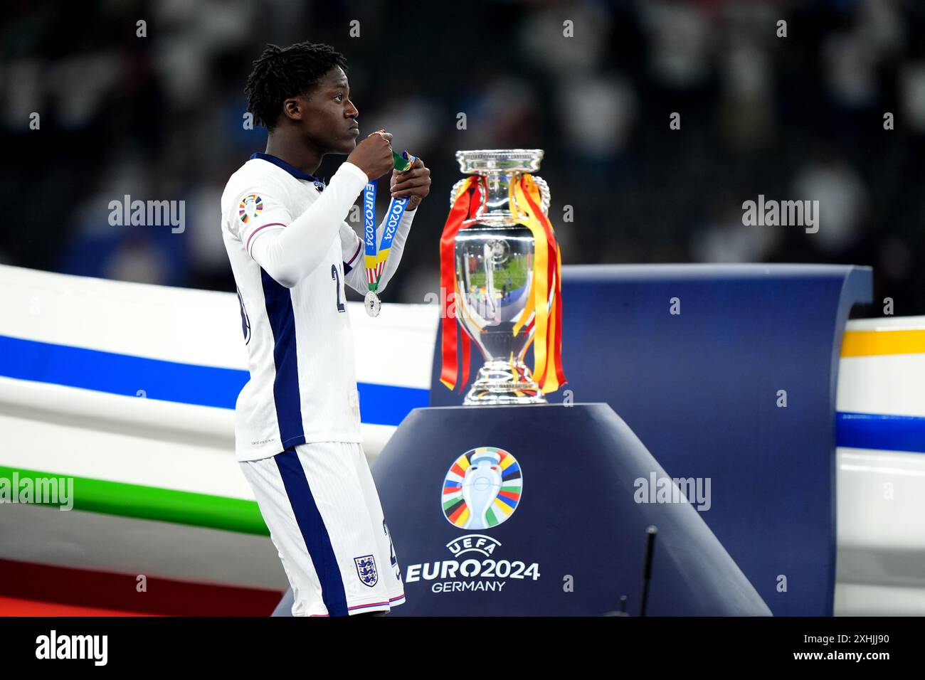 England’s Kobbie Mainoo walks past the trophy after the UEFA Euro 2024 ...