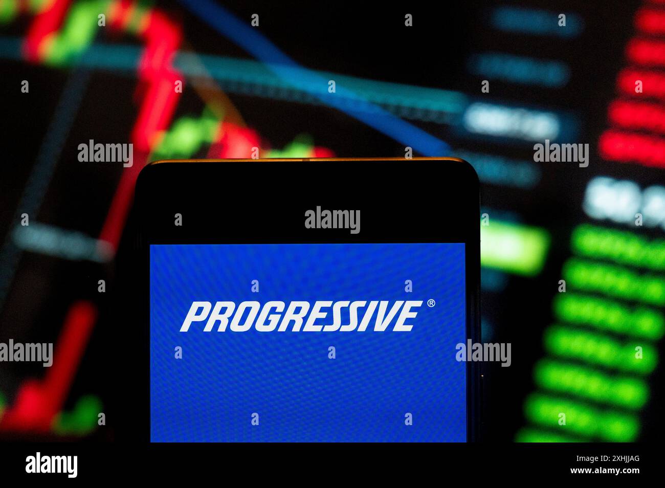 In this photo illustration, the American insurance company Progressive ...