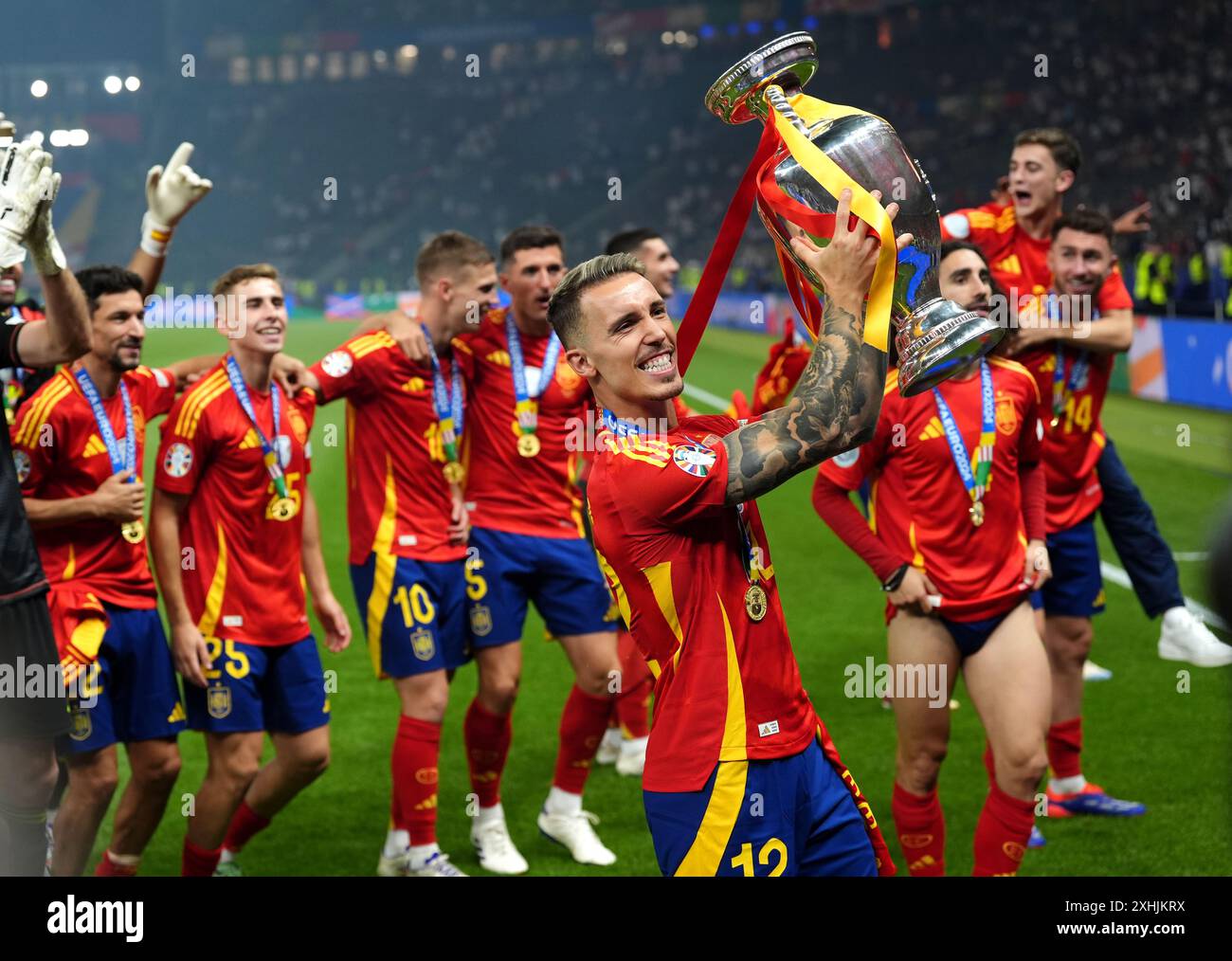 Spain's Alex Grimaldo lifts the trophy following the UEFA Euro 2024 ...