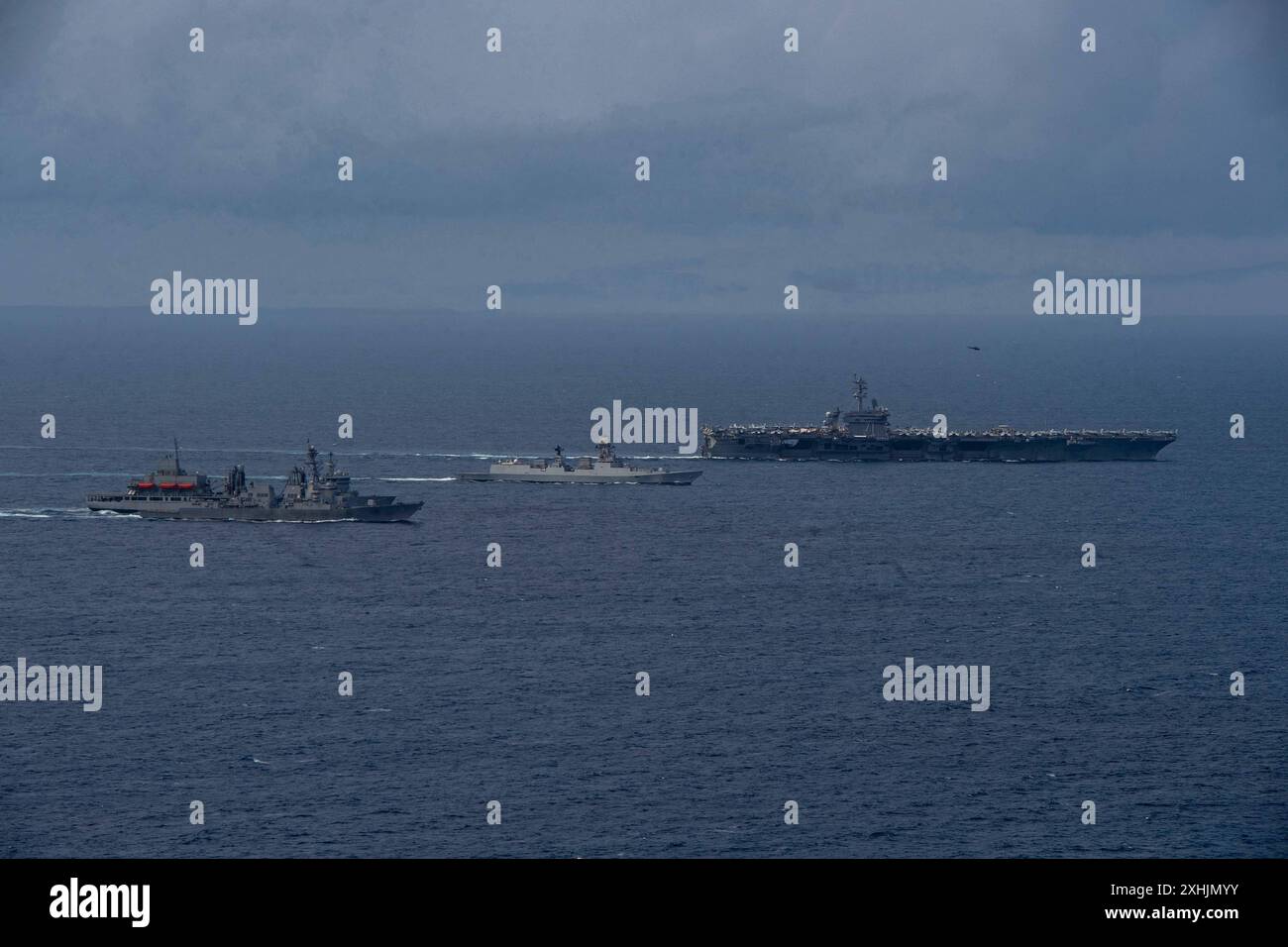 INDIAN OCEAN (July 12, 2024) From front to back: The Arleigh Burke ...